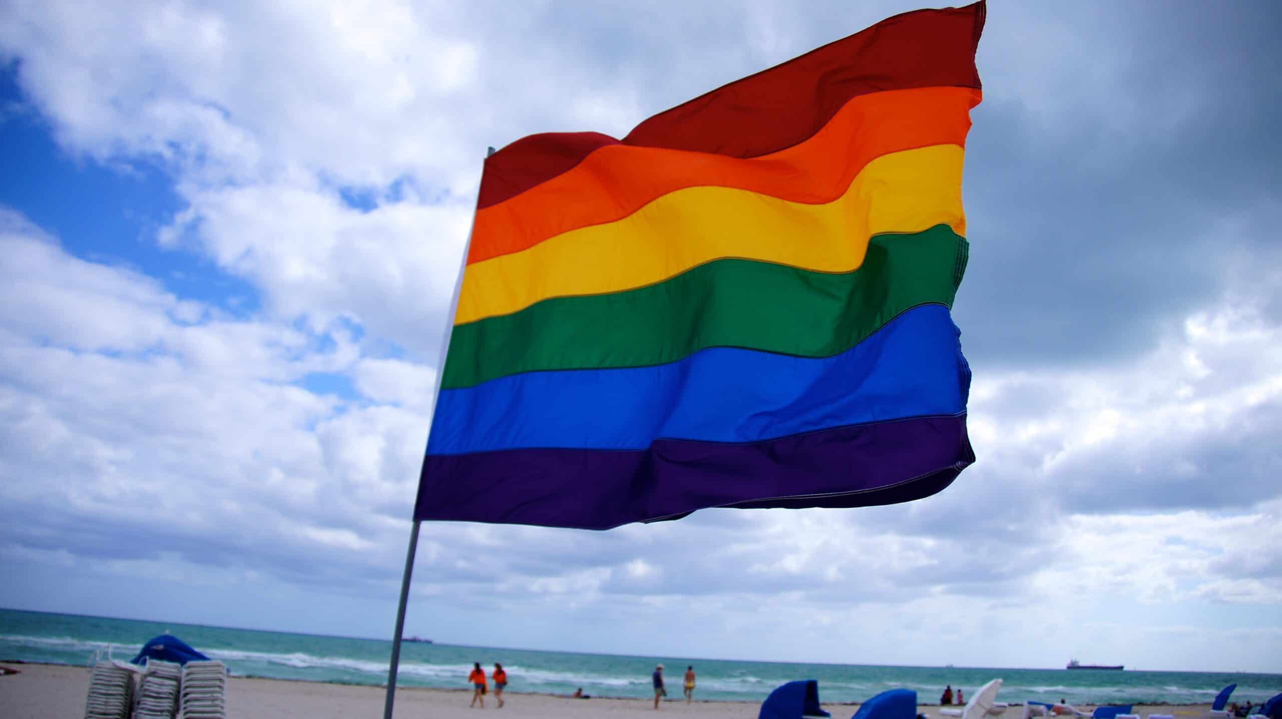 A large rainbow flag flies at the 12th Street Beach, South Beach, Miami ...